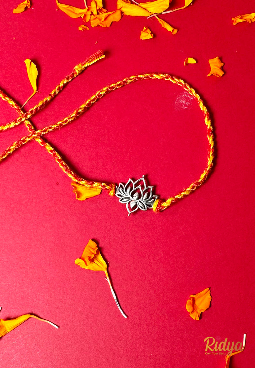 Auspicious Lotus Pure Silver Rakhi